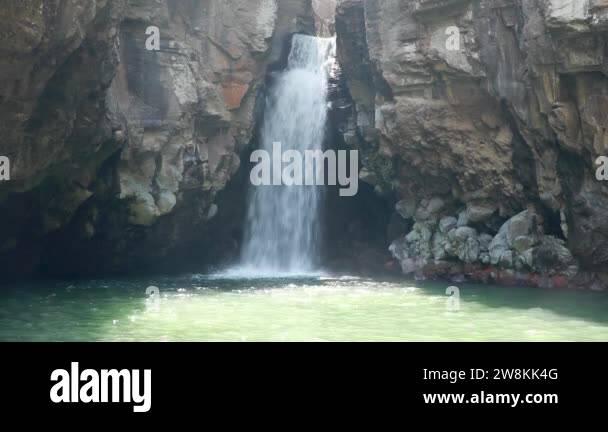 Amazing Barak Tembok waterfall, Falling water hitting water surface ...