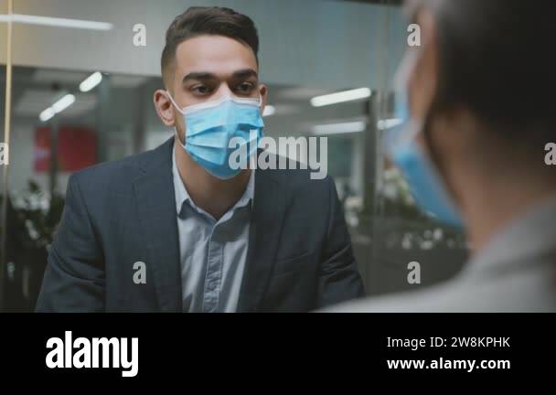 Pandemic and employment concept. Young man hr wearing protective face ...