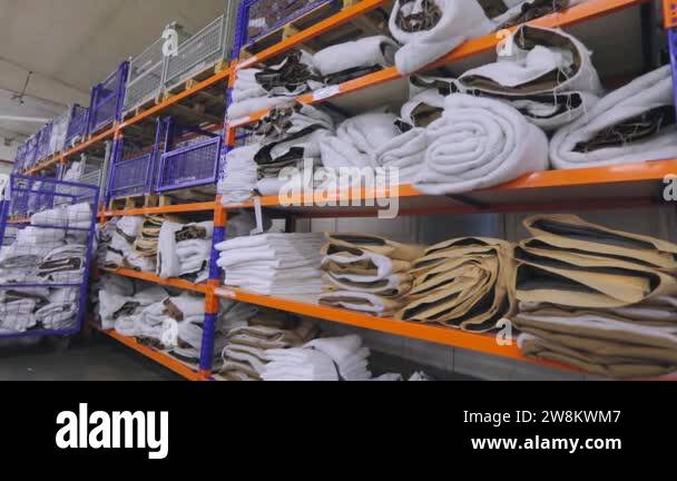 Textile warehouse at a garment factory. Material warehouse at a garment ...