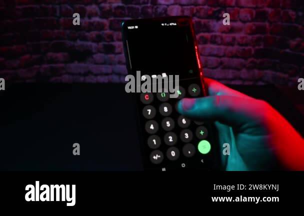 Calculator phone Stock Videos & Footage - HD and 4K Video Clips - Alamy