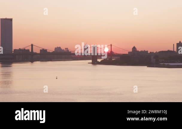 New York City, New York circa-2019. Aerial view of sun rising over New ...