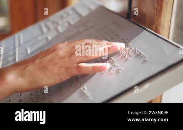 Blind woman reading braille book top view, poorly seeing female person ...