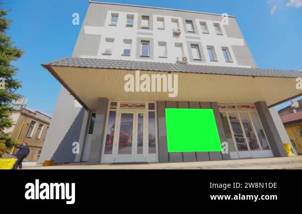 Office building with green screen. advertising banner green screen. An ...