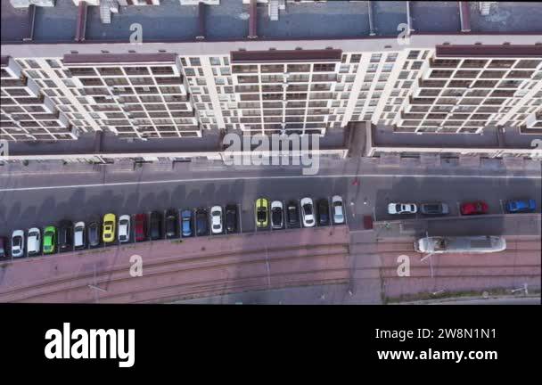 Car parking near Modern apartment building with Large windows and ...