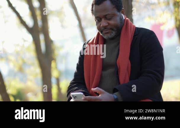 Smiling african man listening music Stock Videos & Footage - HD and 4K Video Clips - Alamy