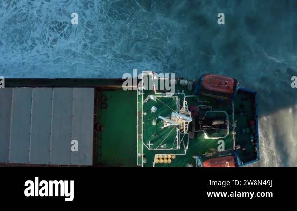 The dry cargo ship washed ashore during a sea storm. Oil spills. An ...