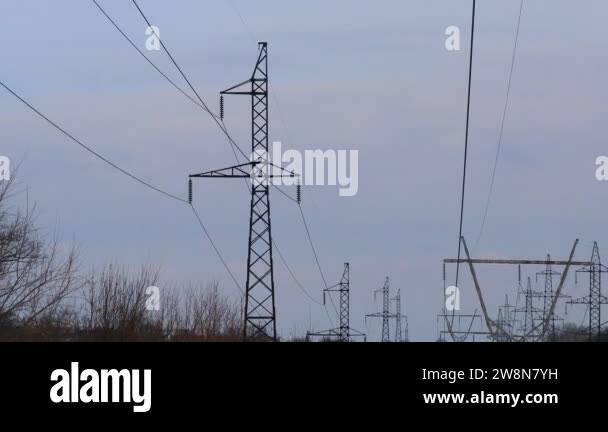 power transmission lines. electrical poles and wires. high-voltage ...