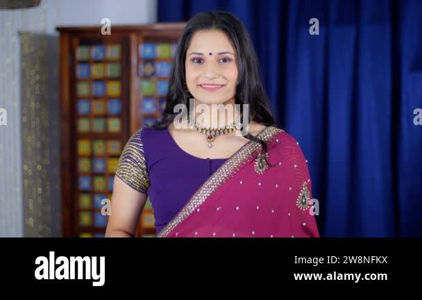 "North Indian women dressed traditionally in saree - Greeting people ...