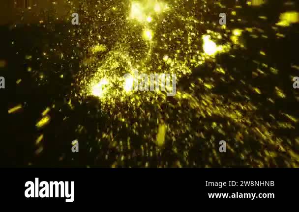 golden particle shower bokeh light. Abstract motion background shining gold particles ...