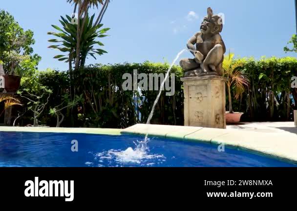 Balinese statue swimming pool Stock Videos & Footage - HD and 4K Video ...