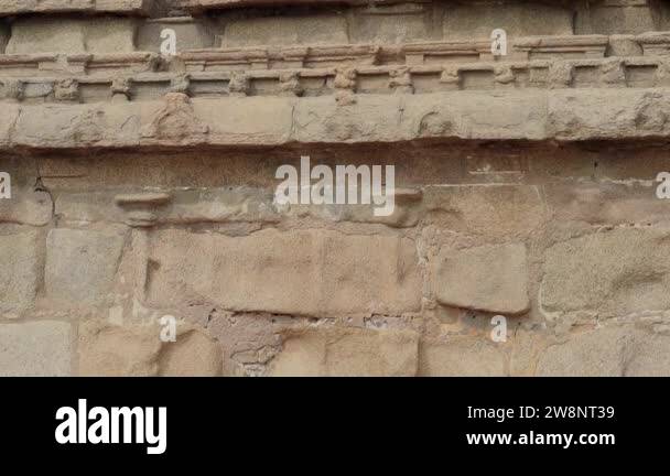 Ancient stone temple. Beach temple carved in stone. Its top to bottom ...