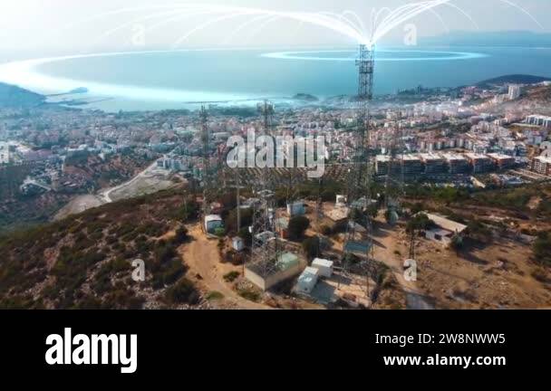 Telecommunication tower on a hill near the city transmitting mobile ...