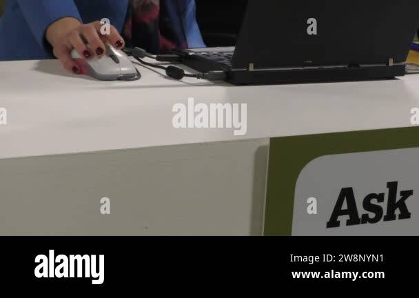 Receptionist sitting behind reception desk Stock Videos & Footage - HD ...