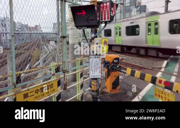 tokyo, japan - november 25 2021: Tilt up video of the signal lights ...