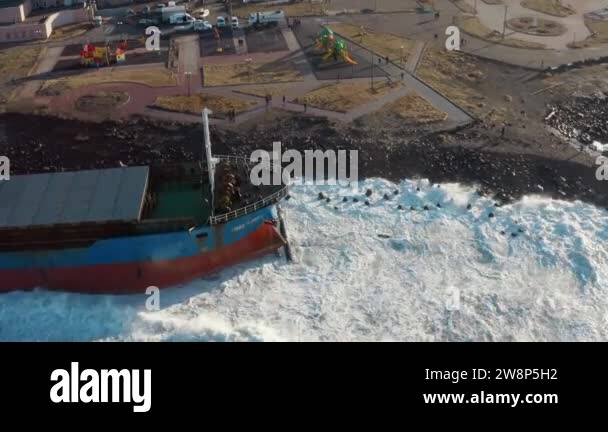 The dry cargo ship washed ashore during a sea storm. Oil spills. An ...