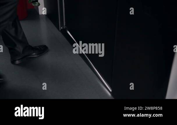 Man entering Stock Videos & Footage - HD and 4K Video Clips - Alamy
