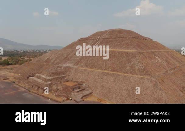 Aerial view orbit around Pyramid of Sun in Teotihuacan complex in ...