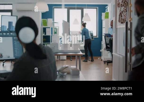 Man Analyzing Blueprints Plan And Building Model On Table To Design Construction Structure Stock