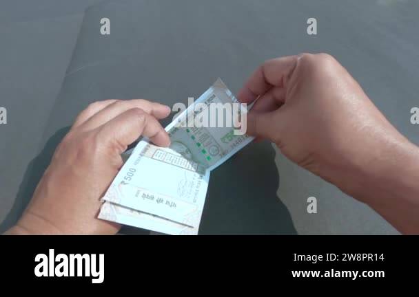 Hand holding five notes Stock Videos & Footage - HD and 4K Video Clips ...