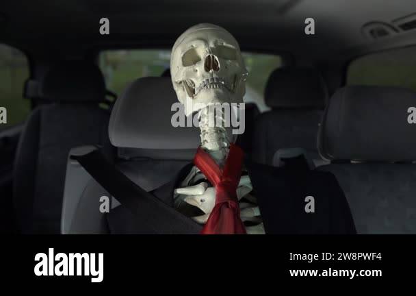 Skeleton driving car Stock Videos & Footage - HD and 4K Video Clips - Alamy