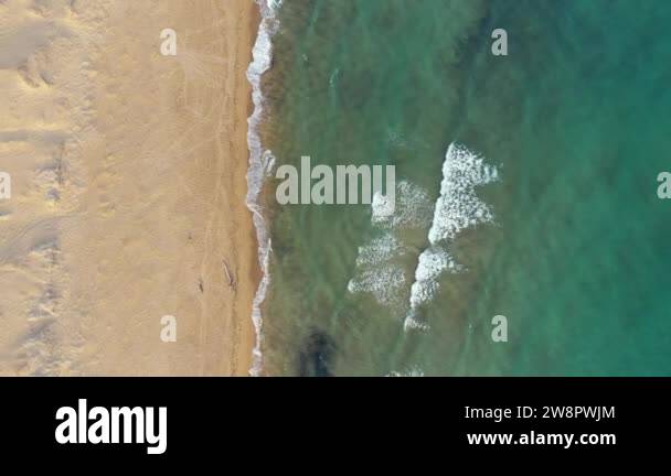 Tropical beach aerial view, Top view of waves break on tropical yellow ...