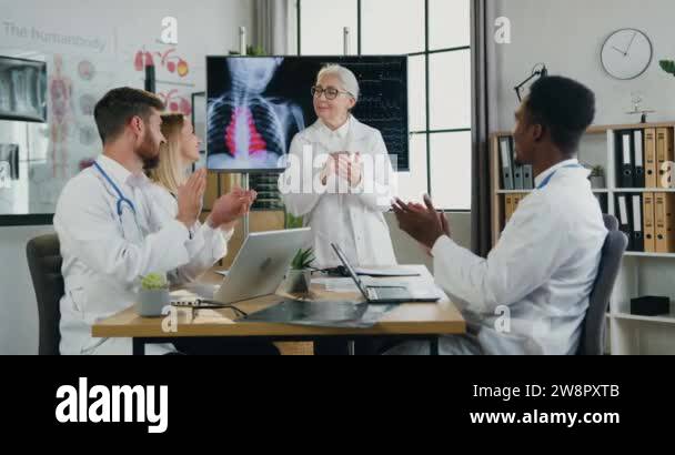 Attractive positive successful multicultural doctors with female head ...