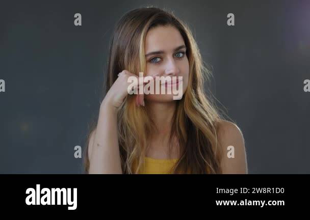 Young lady girl invites contact by phone. Playful happy pretty woman ...