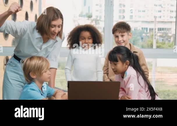 Group of diverse student and teacher celebrate successful project ...