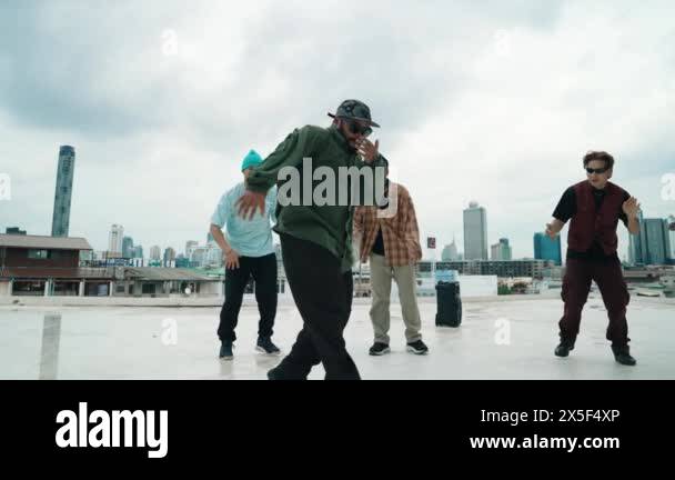 Professional break dance team practice B-boy dance while multicultural ...