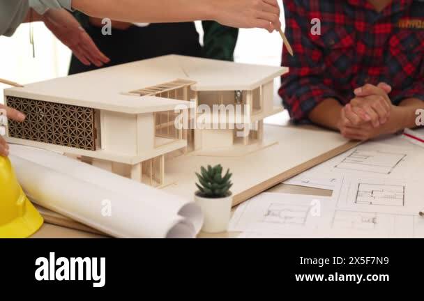 Slow motion home designer using architectural equipment review and ...