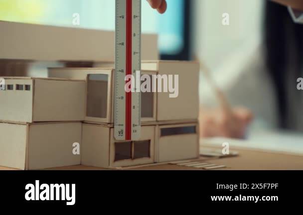 Close up of skilled professional engineer hand using ruler measure ...