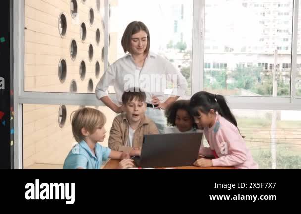 Cute african girl programing system while surround with caucasian ...