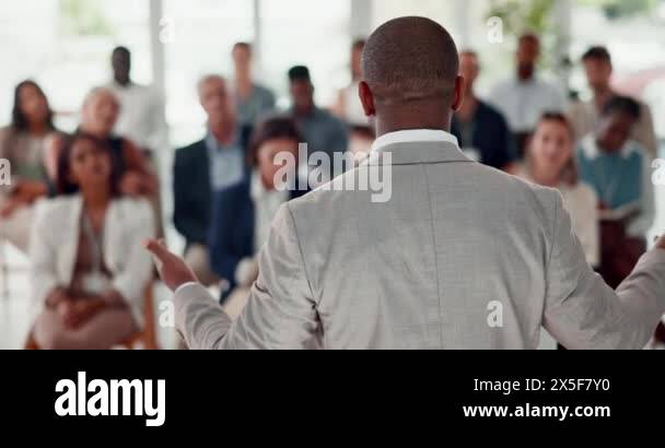Business man, back and presentation at seminar, convention and speaking ...