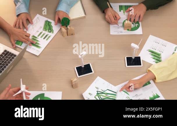 Excellent business team discussing on eco house project at meeting ...