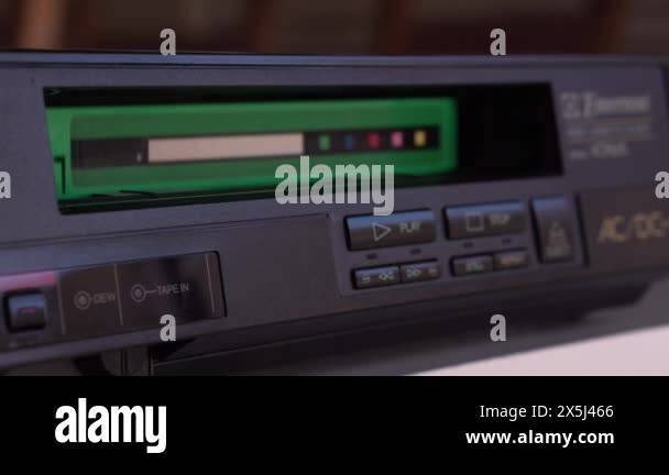 Ejection of VHS Video Cassette Tape From Vintage 1980s Player, Close Up ...