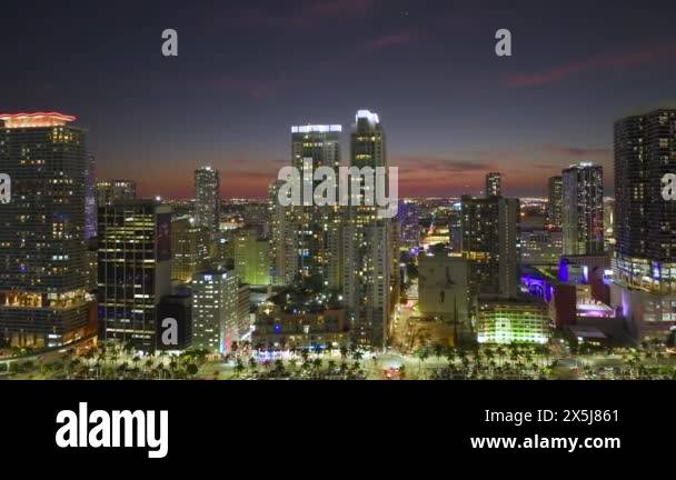 Illuminated skyscraper buildings in downtown district of Miami Brickell ...