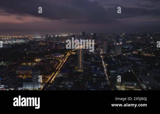 Beautiful evening aerial panoramic view of metropolis. Illuminated ...