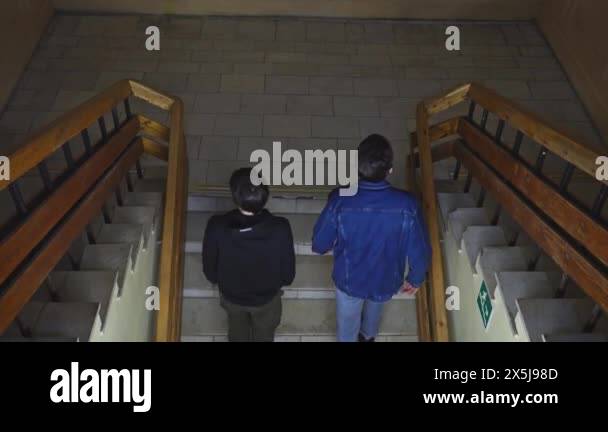 Students walk up stairs of building. Media. Students climb stairs of ...