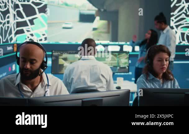 Call center employee communicating alternative routes for couriers ...