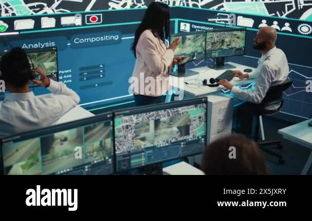 Indian manager and her team monitoring their delivery cars in traffic ...