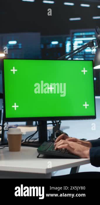 Vertical Video It Employee Programming On Green Screen Pc In Data