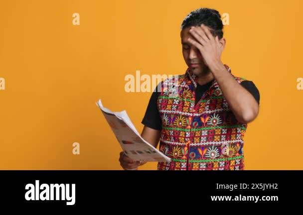 Man browsing though financial audit report files, slapping them in ...