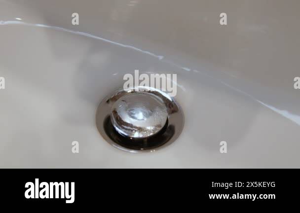 Clear water pours drain sink personal hygiene bathroom cleanliness ...