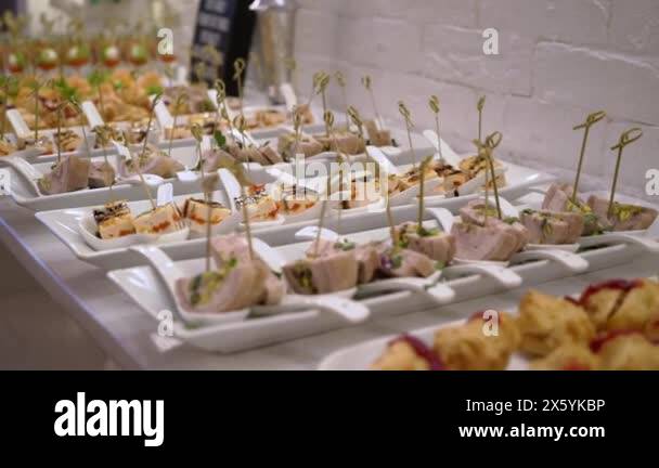 Canapes food at welcome reception dinner buffet in restaurant party ...
