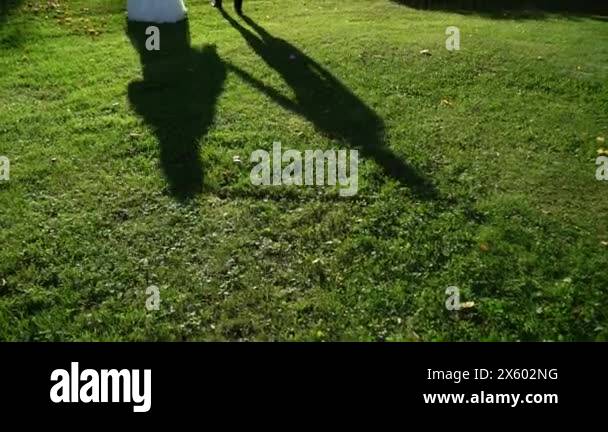 Lovely couple shadow. People walking outdoors in summer day. Silhouette ...