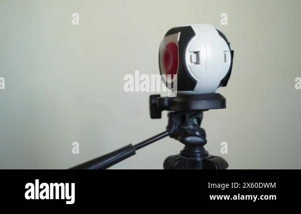 Laser Level measuring tool with visible red laser beam crossing Stock ...