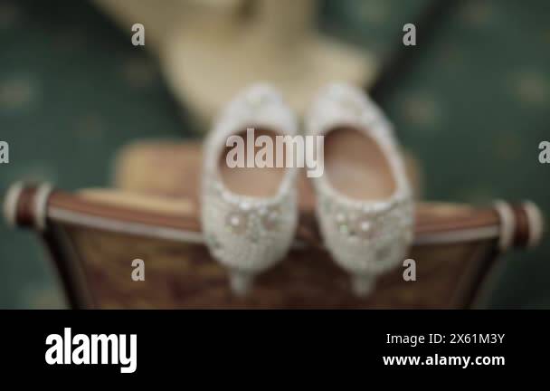 Shoes on chair Stock Videos & Footage - HD and 4K Video Clips - Alamy