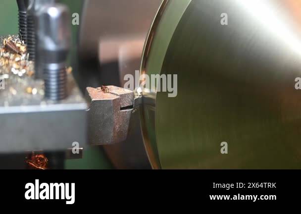 Slow motion scene the turning machine finish cut the metal parts. The ...