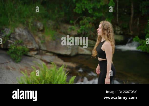 Solo traveler enjoys nature walk, explores scenic trails. Active woman ...