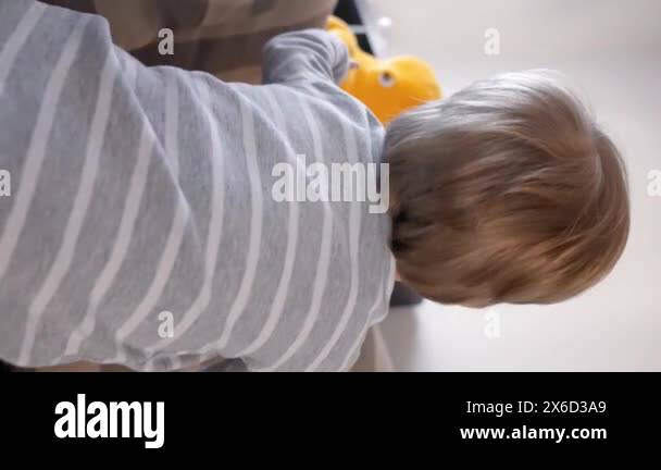 Witness the magical moment as a wide-eyed little boy cherishes an ...